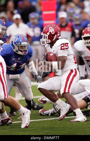 Oklahoma running back Chris Brown (29) scrambles for yardage with ...