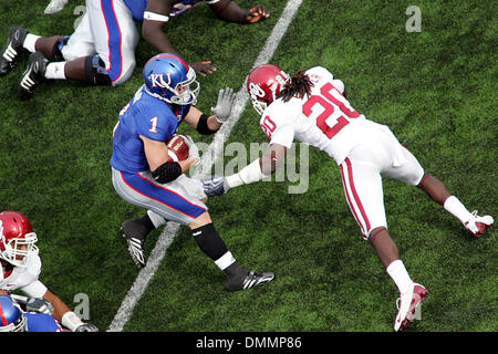 Kansas running back Jake Sharp (1) gets by Oklahoma cornerback Quinton ...