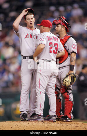 Los Angeles Angels pitching coach Mike Butcher speaks to Los Angeles ...