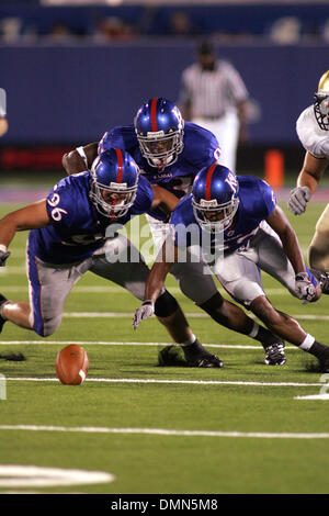 Kansas cornerback Ryan Murphy (23) recovers a Northern Colorado fumble ...