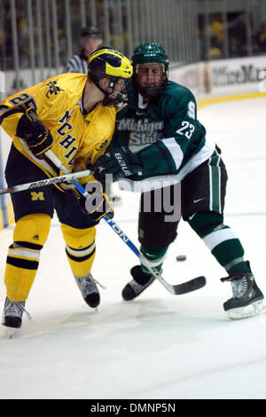 Michigan State Defenseman Matt Grassi (23) and Notre Dame Right Wing ...