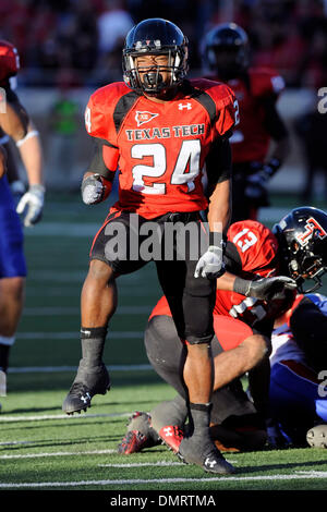 Texas Tech RB Eric Stephens (24) blasts through the line of scrimmage ...