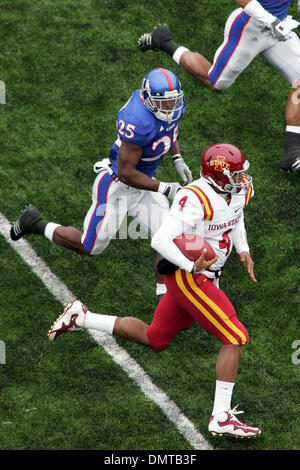 Kansas safety Darrell Stuckey (25) attempts to bring down Iowa State ...