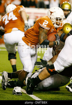 Texas running back Vondrell McGee (2) celebrates with quarterback Colt ...