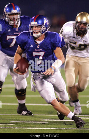 Kansas quarterback Kale Pick (7) scrambles to gain yardage during game ...