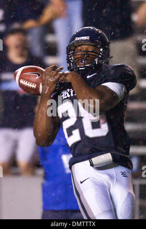 Charles Ross (#28) of the Rice Owls breaks free from Jeffery Lewis (#28 ...