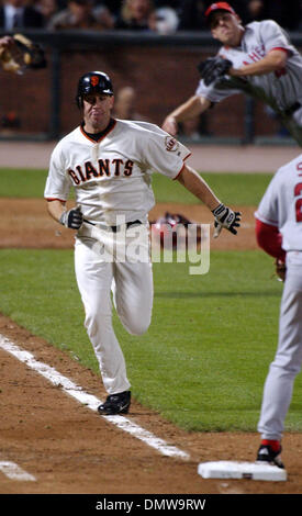 San Francisco Giants pitcher Kirk Rueter throws to first base in the ...