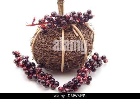 Straw ball with berry branch Stock Photo - Alamy