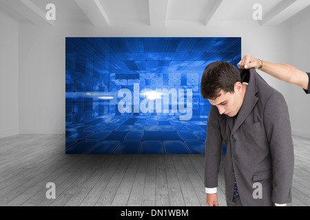Composite image of businessman hanging Stock Photo - Alamy