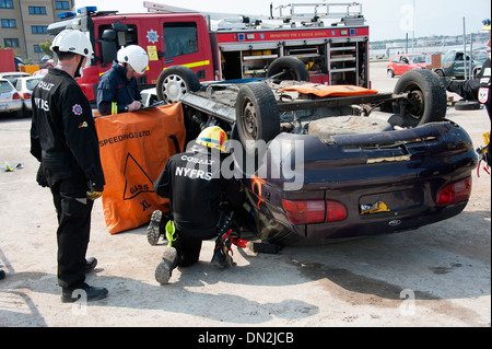 Firefighters Extricating Casualty from RTC SIMULATION Stock Photo - Alamy