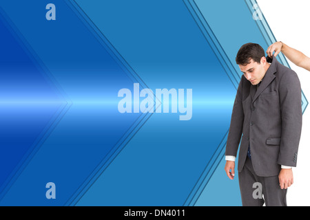 Composite image of businessman hanging Stock Photo - Alamy