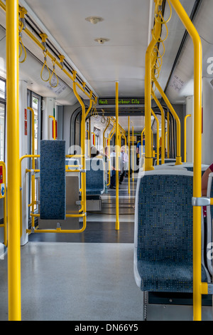 Seats inside of the vintage tram at the railway station in Soller. The ...