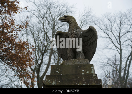 Eagle statues atop of entrance gate posts to country houses Stock Photo ...