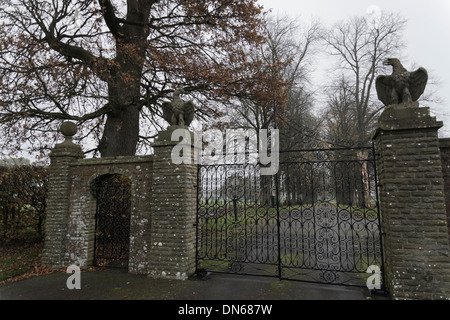 Eagle statues atop of entrance gate posts to country houses Stock Photo ...