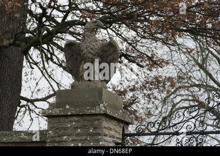 Eagle statues atop of entrance gate posts to country houses Stock Photo ...