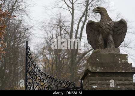 Eagle statues atop of entrance gate posts to country houses Stock Photo ...