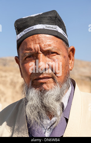 Portrait of Uzbek man wearing traditional skullcap, Uzbekistan Stock ...