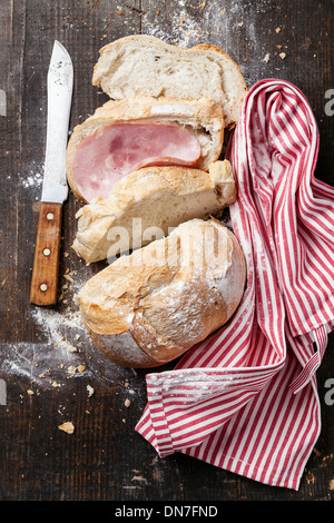 Slices of White Bread on a Rustic Wooden Board, side view Stock Photo ...