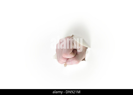hand punching through paper on white background Stock Photo - Alamy