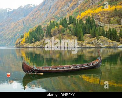 A beautiful Viking rowboat is moored in Nærøyfjord near Gudvangen ...