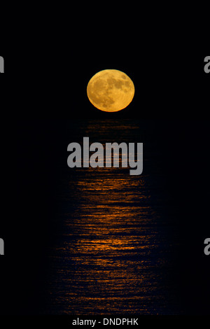 The full moon rising over the dramatic mountains of Zion National Park ...