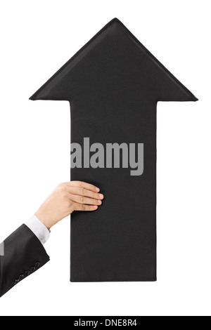 Hand holding a black arrow on a white background Stock Photo - Alamy