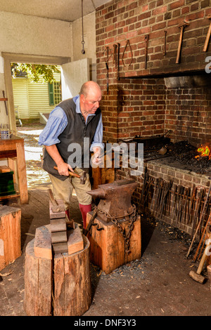Colonial Williamsburg craftsman in the James Geddy silversmith shop Stock Photo - Alamy