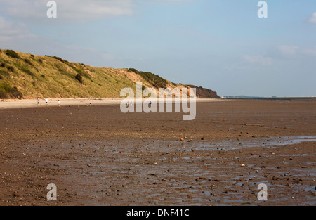 Mud flats and sandstone cliffs at Thurstaston on The Wirral Peninsular ...
