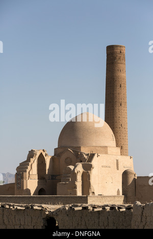 Seljuk architecture brick minaret mosque in Erzurum. In the background ...