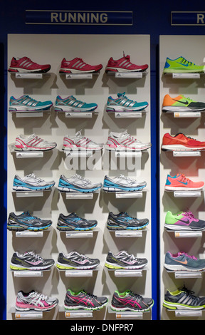 Sports shoes are on display at a shoe shop in Magdeburg, Germany, 30 ...