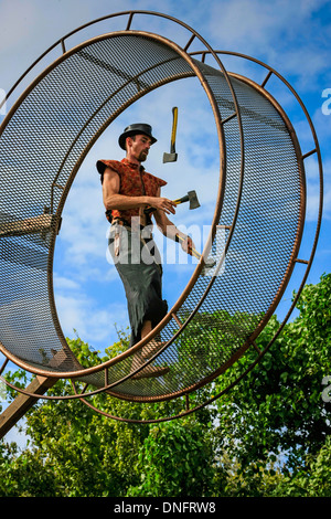 Circus performer entertaining the public with his hamster wheel Stock ...