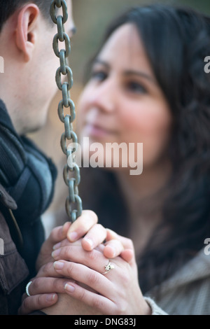 Happy bride and groom share a loving moment filled with laughter and ...