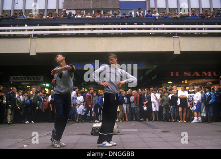 Teenagers breakdancing 1980s in a shopping centre Stockport Lancashire ...