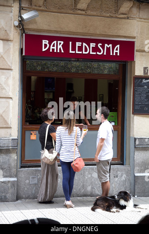 Bilbao Spain bar caffe people in street Stock Photo - Alamy