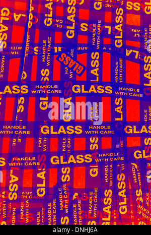 "Glass Handle with Care" tape wrapped around a fragile parcel Stock ...