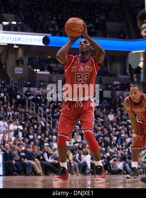 St. John's Rysheed Jordan (23) goes up for a dunk over Villanova's ...