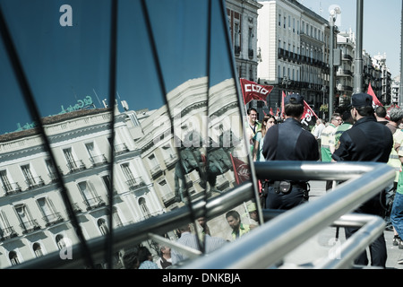 Police observing demonstrators, Madrid, Spain Stock Photo - Alamy
