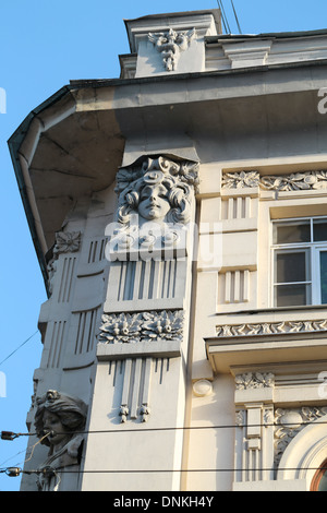 Beautiful girl at an old building with flowers Stock Photo - Alamy