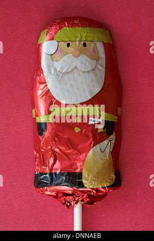 Chocolate Santas, lollipops Stock Photo - Alamy