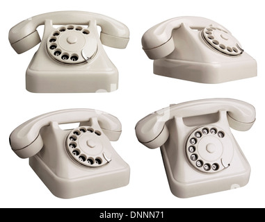 Old telephone with rotary dial of different colors isolated on white ...