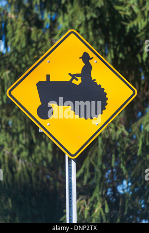 Tractor crossing sign Stock Photo - Alamy