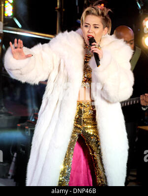 Miley Cyrus performs at the New Year's Eve 2014 Celebration in Times ...