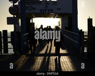 Hiddensee, Germany. 03rd Jan, 2014. Tourists stand on deck of a ferry ...