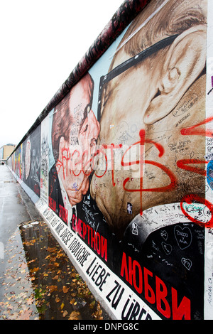 06/12/2013 Berlin Wall mural showing Leonid Brezhnev kissing East ...