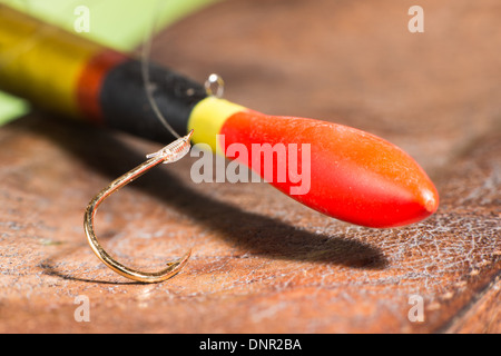 Hooks for fishing and float. Macro shot. Natural look Stock Photo - Alamy