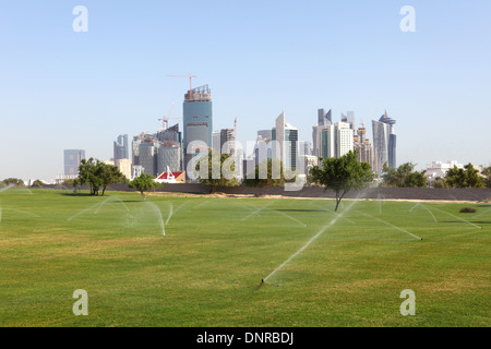 View of Doha from the green lawn behind the city. Qatar, Middle East ...