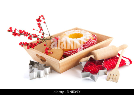 Baking turban and cookies for Christmas isolated over white background ...