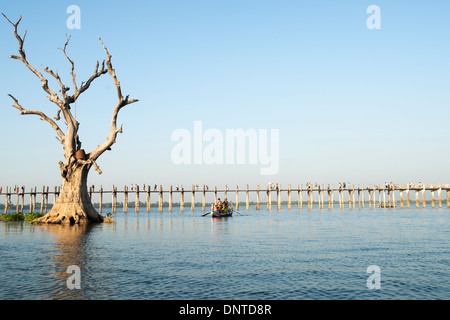People watch the sun set over Tampa Bay Saturday, Feb. 6, 2021, in ...