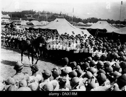 Italian dictator Benito Mussolini riding a horse with a small child ...