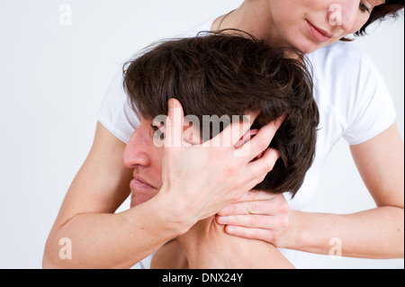 cervical mobilization manual therapy cervical spine Stock Photo - Alamy